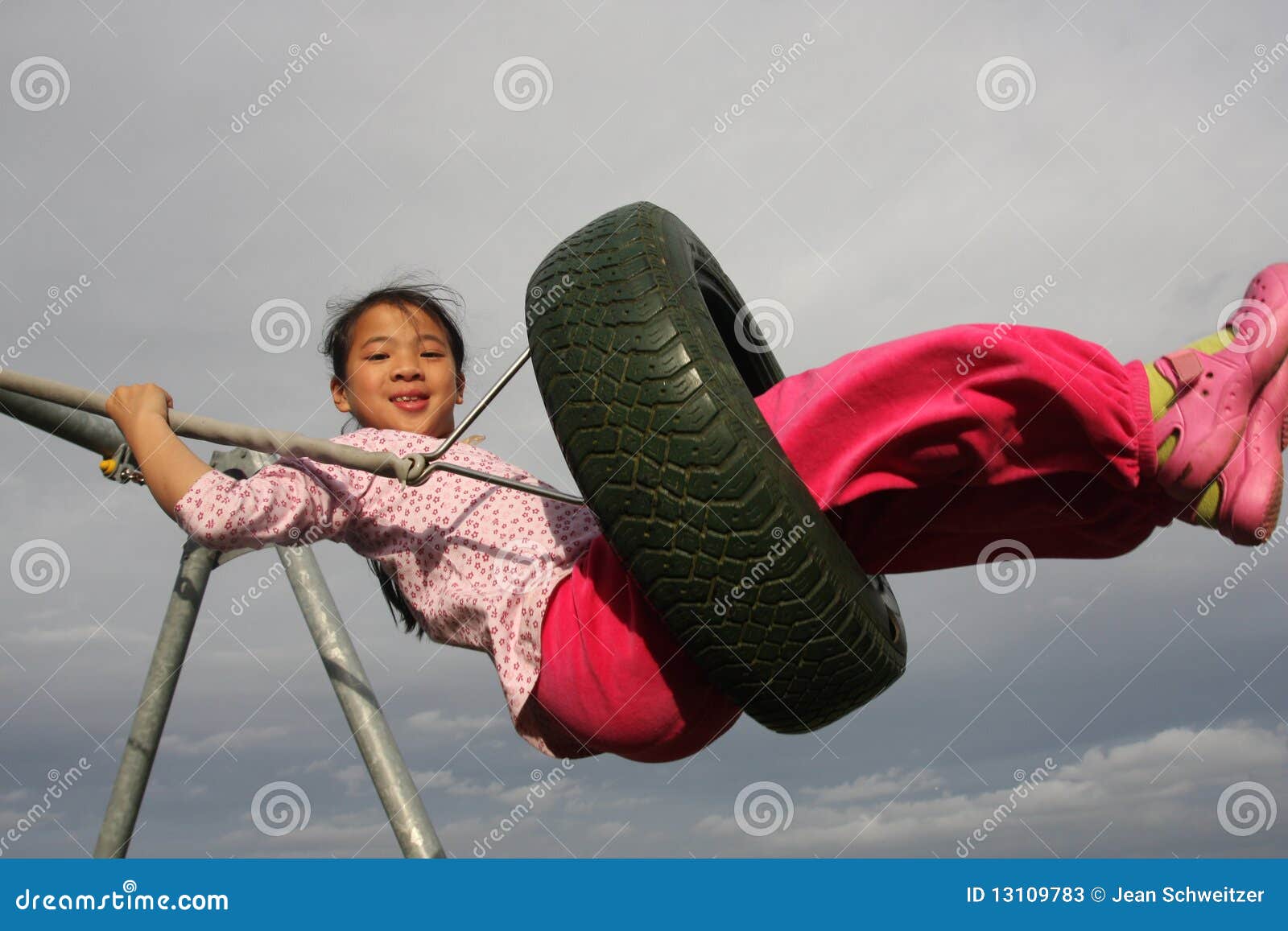 Seesaw On Child Playground In Park. Childs Horse Ride In The Playground ...