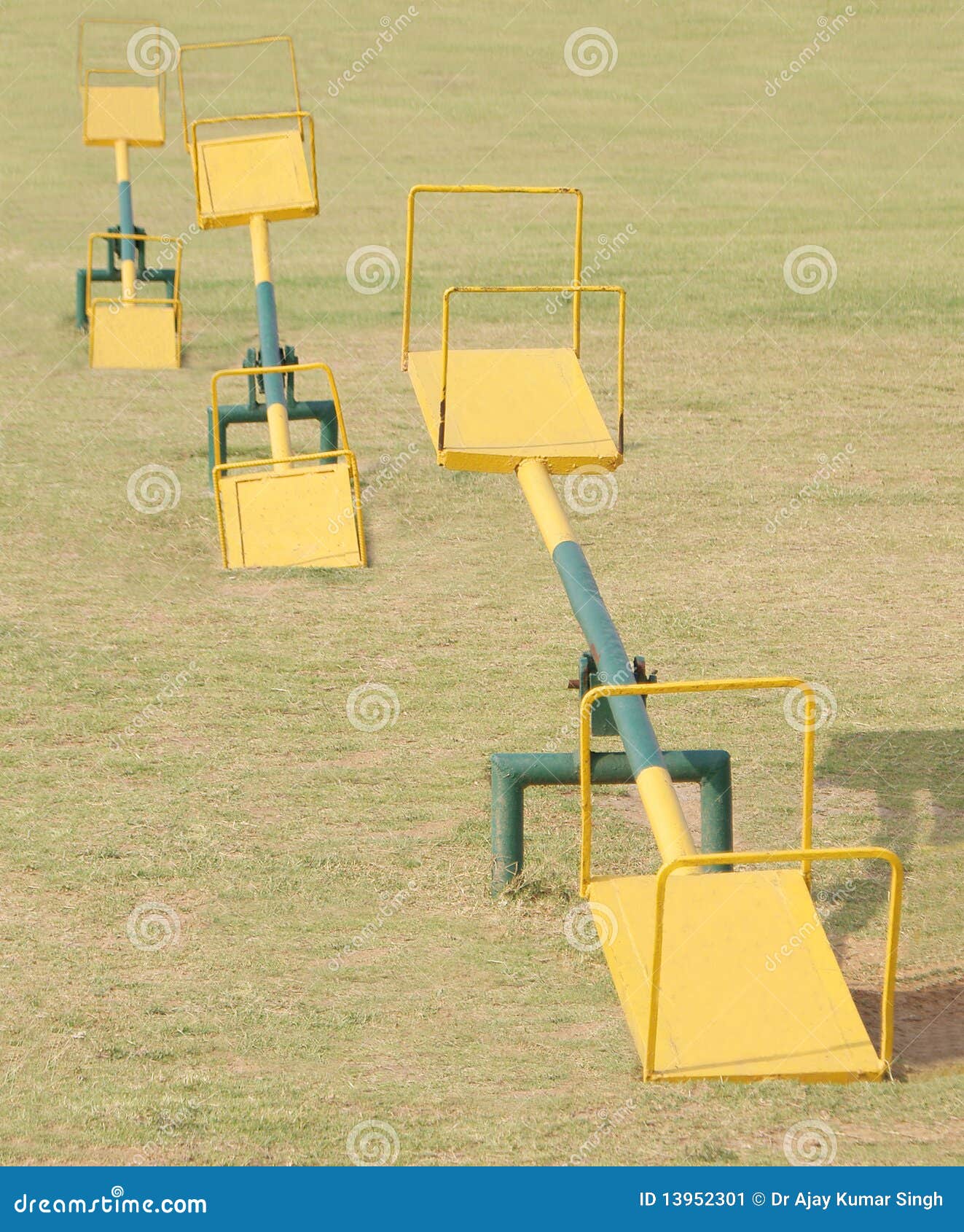 Seesaws in a garden stock image. Image of garden, park - 13952301