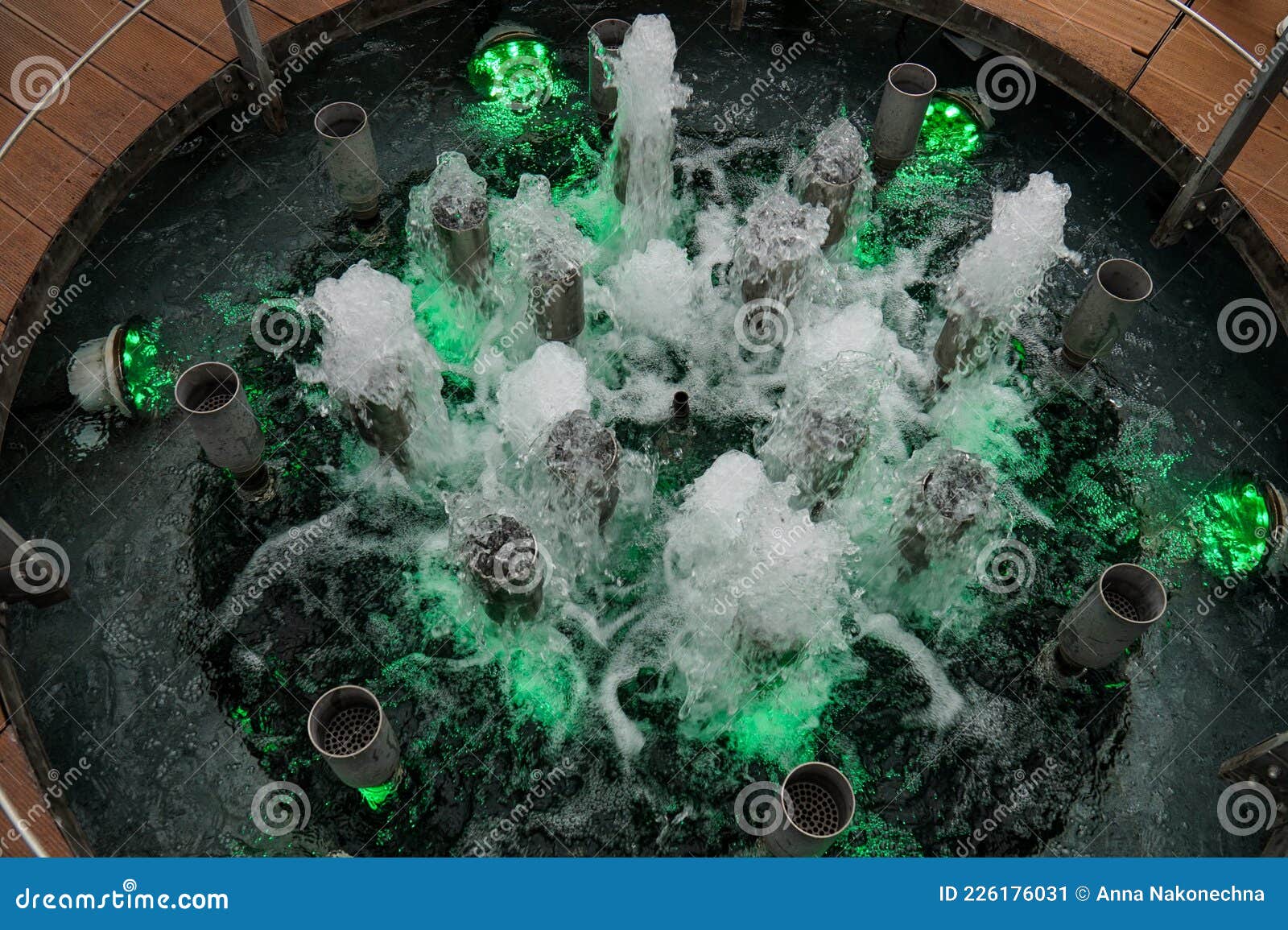 Seething Water in a Multi-colored Backlight Fountain. Editorial Photo ...
