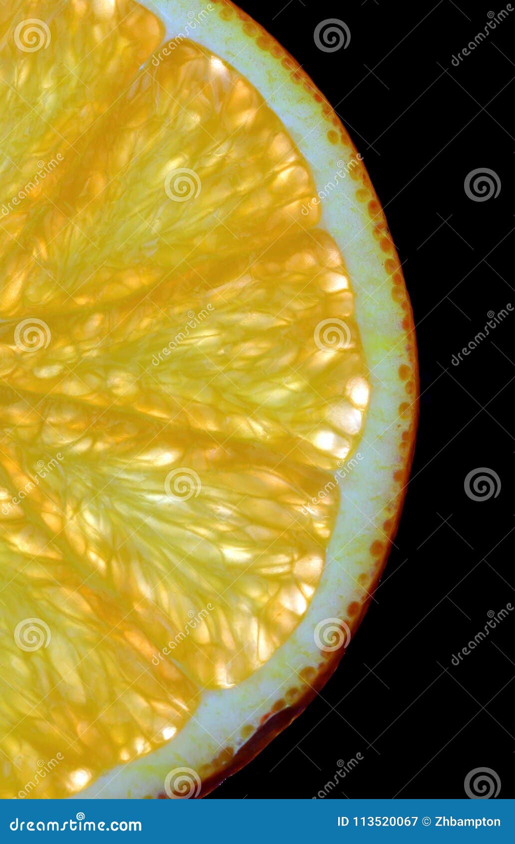 Segment of Orange Fruit on a Black Background Bursting with Flavour ...