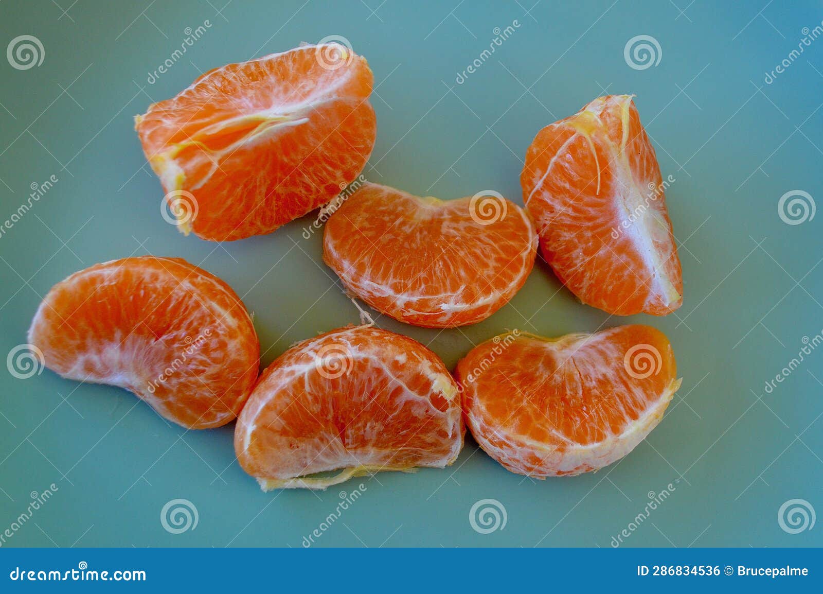 Segments of an Imperial Mandarin on a Plate in the Kitchen Stock Photo ...