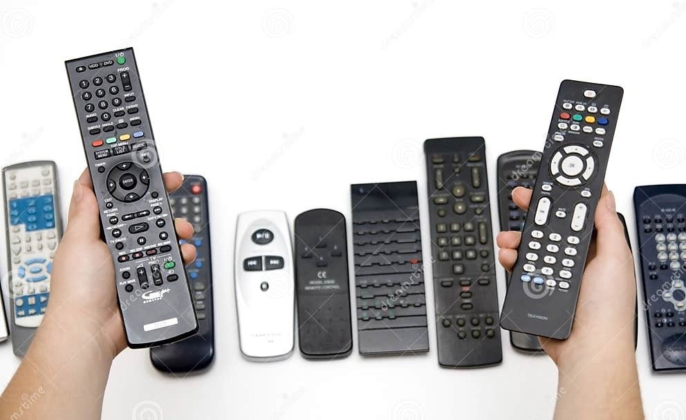 Many Assorted Remote Controls in Hands Stock Image - Image of little ...