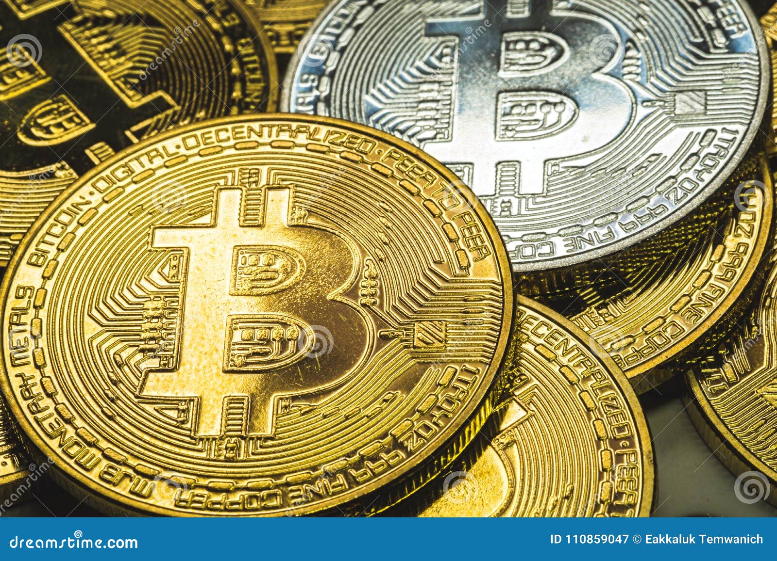 Select Focus Close Up a Stack of Silver and Gold Bitcoins with Gold ...