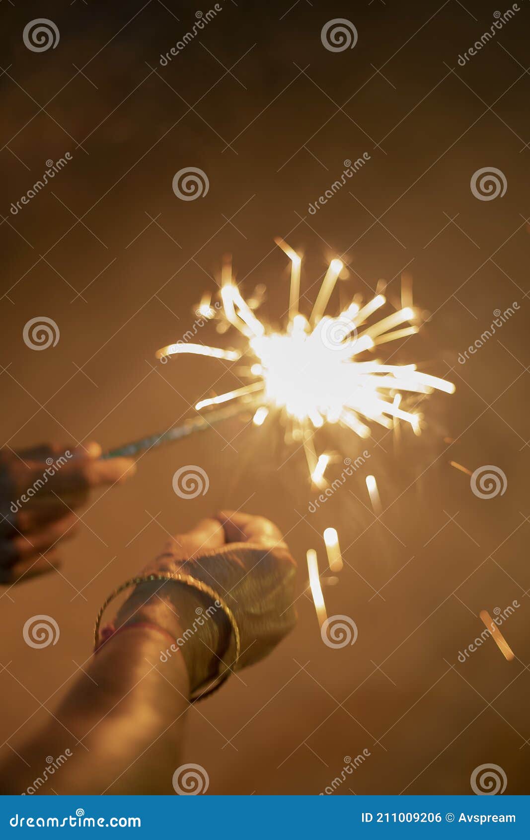 Selected Focus Shot of an Indian Woman Holding a Firecracker Stock ...