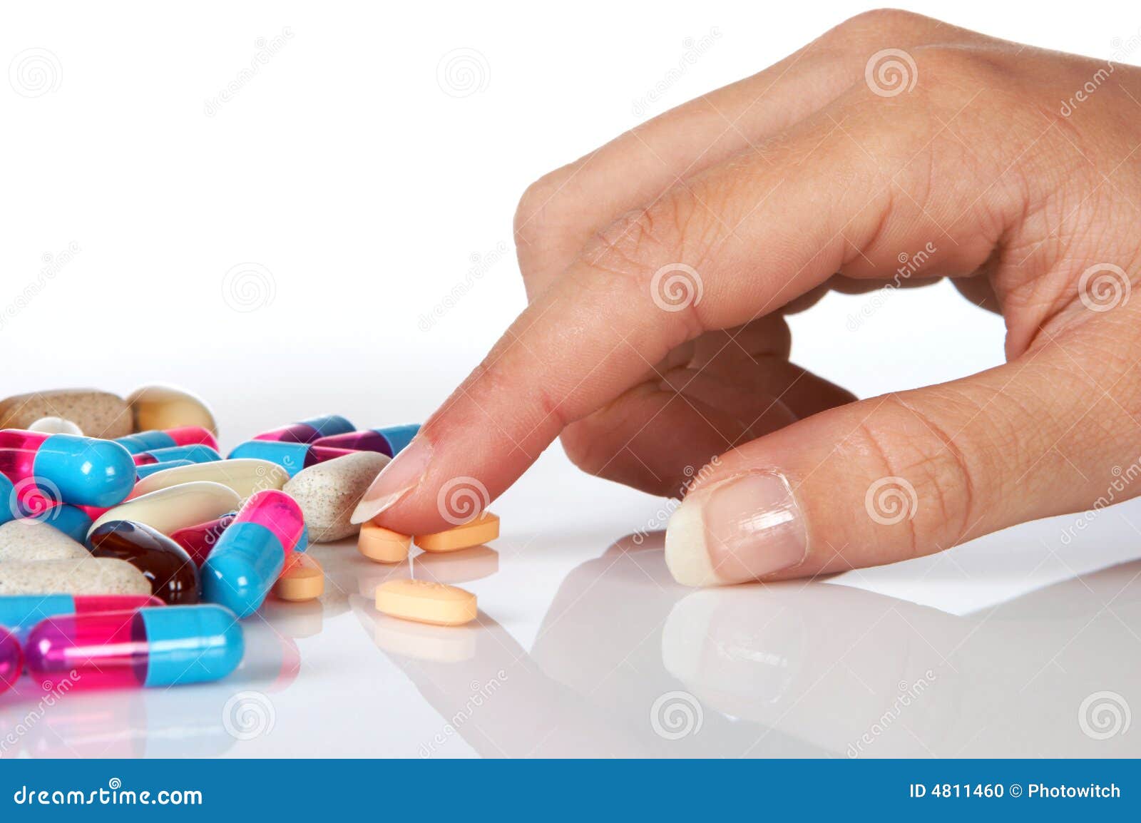 Selecting pills stock photo. Image of addiction, painkillers - 4811460