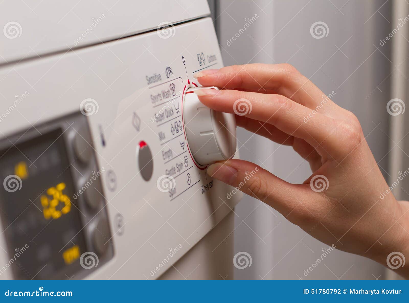 Selecting a Program for Washing Laundry. Stock Photo - Image of ...