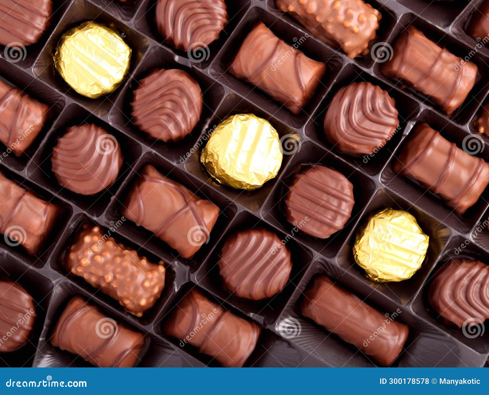 Selection of Assorted Chocolate Candies Stock Photo - Image of overhead ...