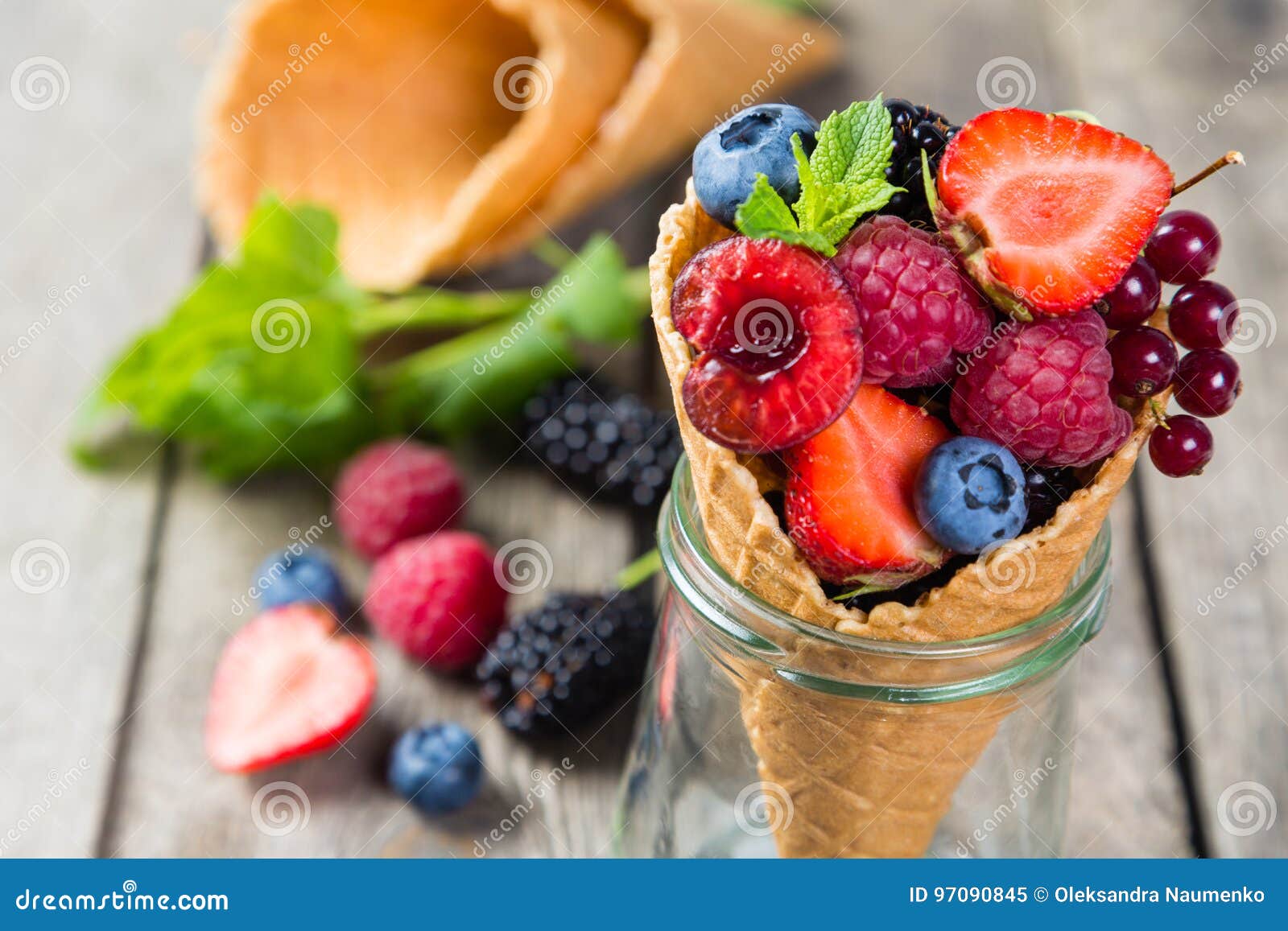 Selection of Berries in Ice Cream Cones - Healthy Dessert Concept Stock ...