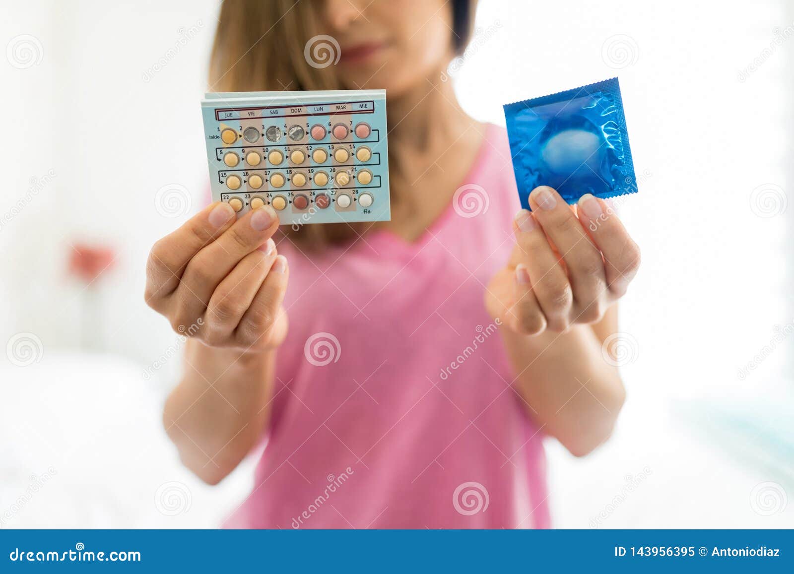 Selection Between Birth Control Pills And Condom Stock Image Image Of