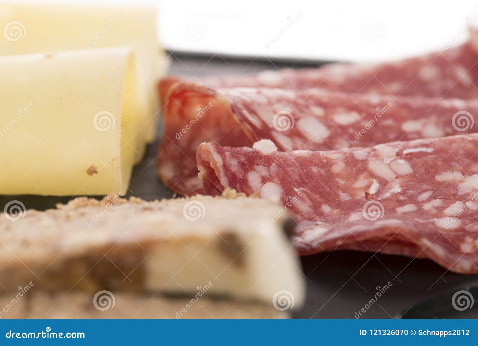 Selection of Cold Cuts and Cheese on a Platter with a Glass of Red Wine ...