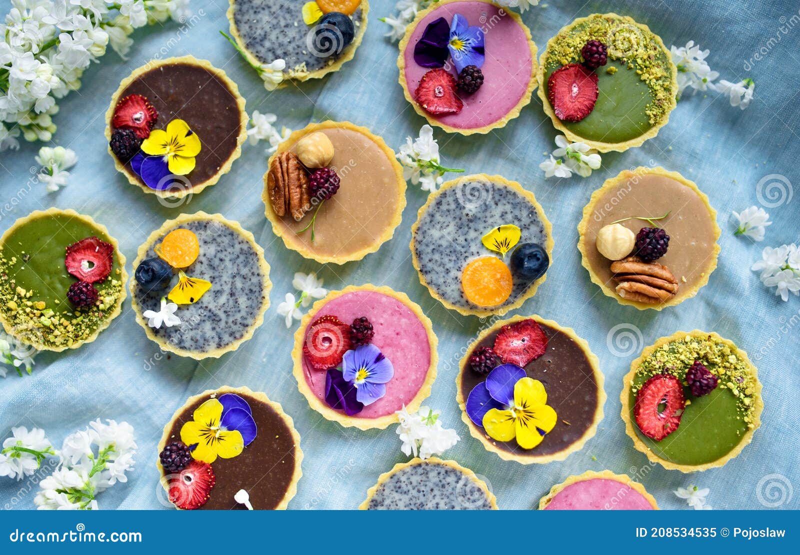 Selection of Colorful and Delicious Cake Desserts in Box on Table, Top ...