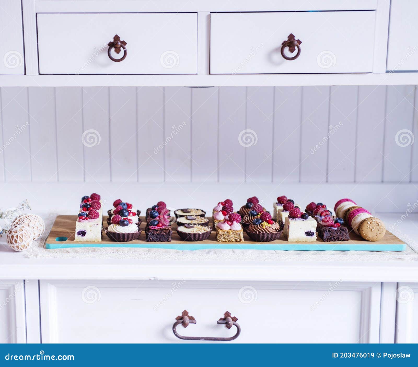 Selection of Colorful and Delicious Cake Desserts on Tray on Kitchen ...