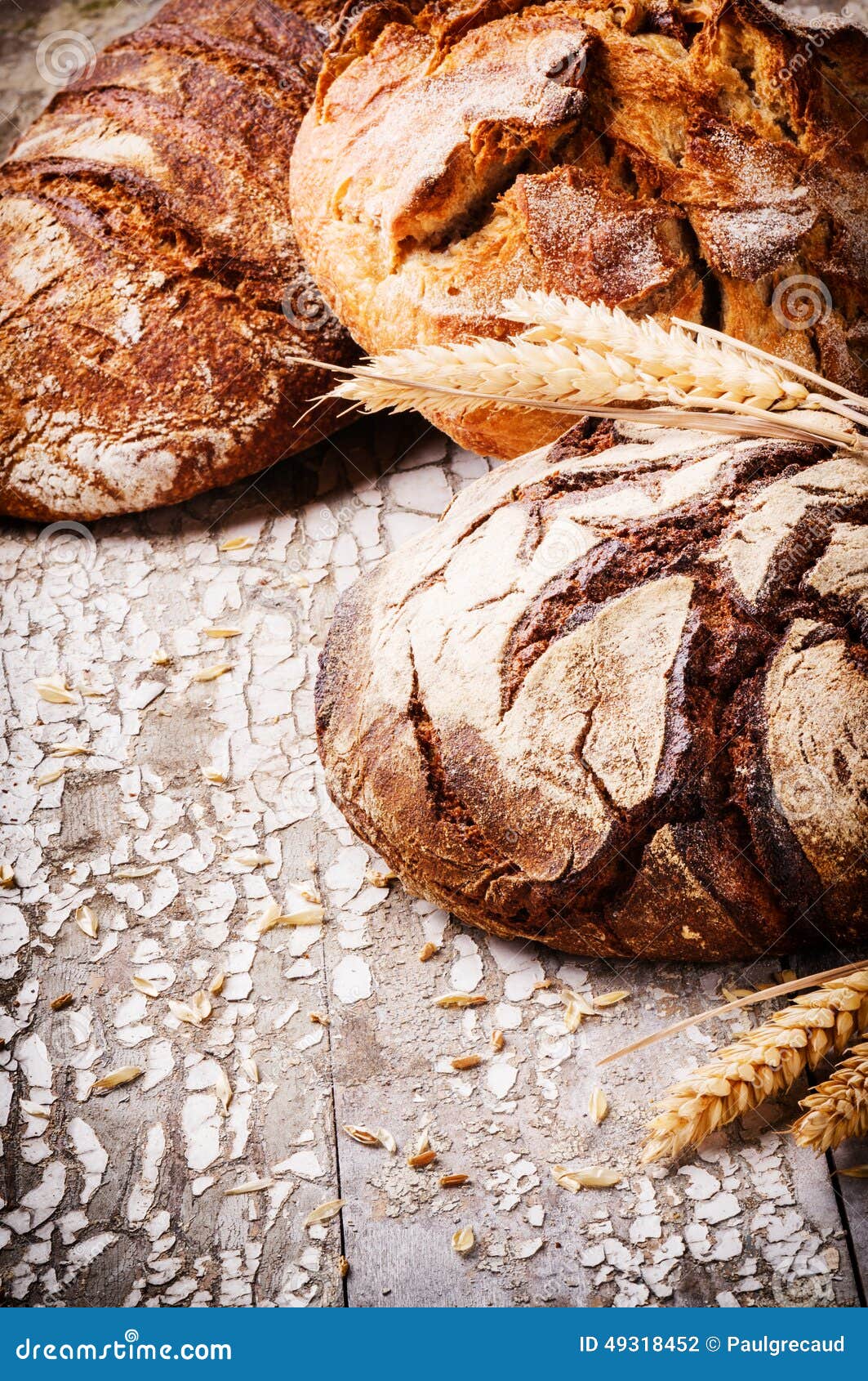 Selection of Freshly Baked Bread in Rustic Setting Stock Photo - Image ...