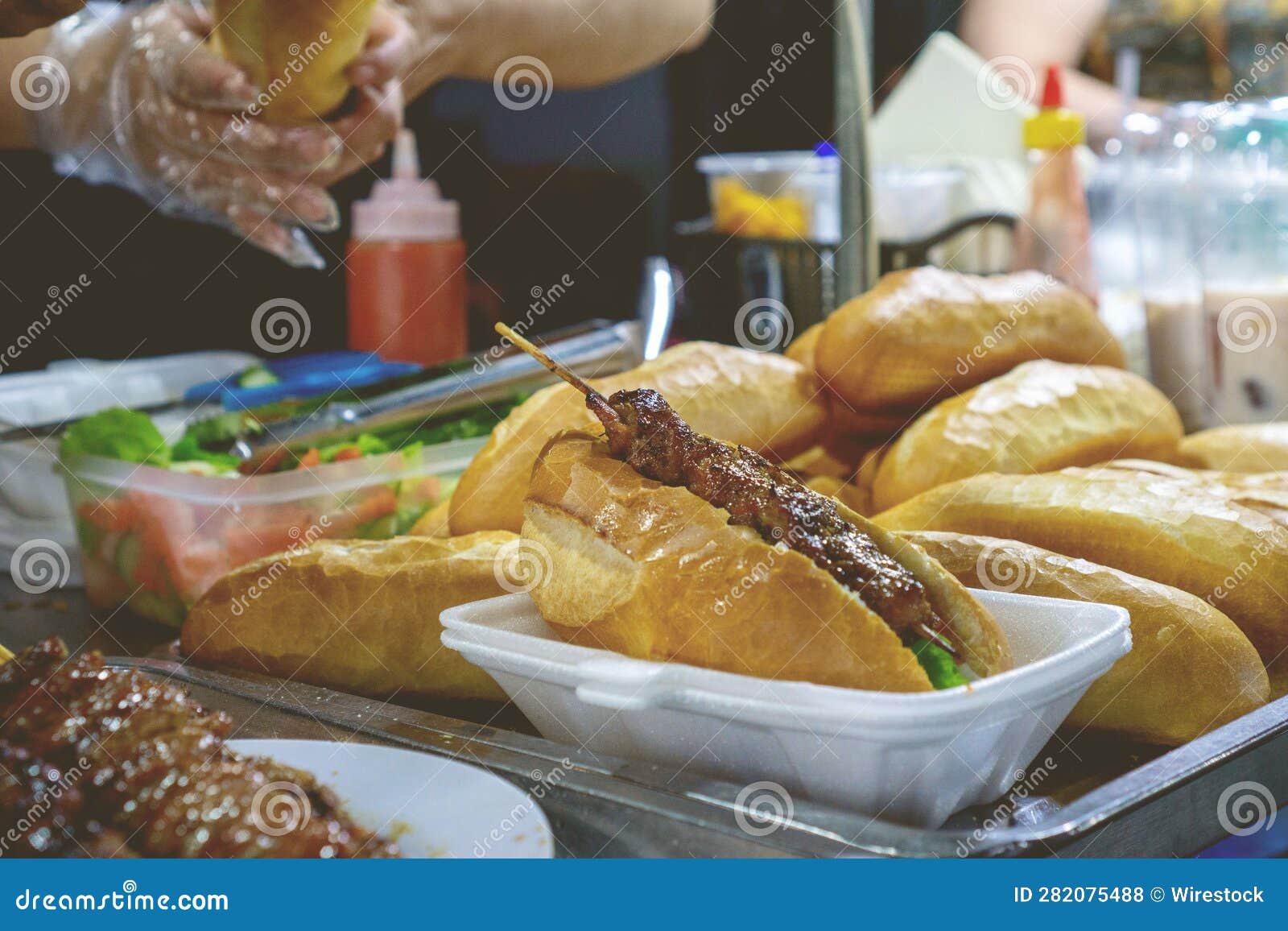 Selection of Freshly-baked Buns Arranged in Various Containers Stock ...