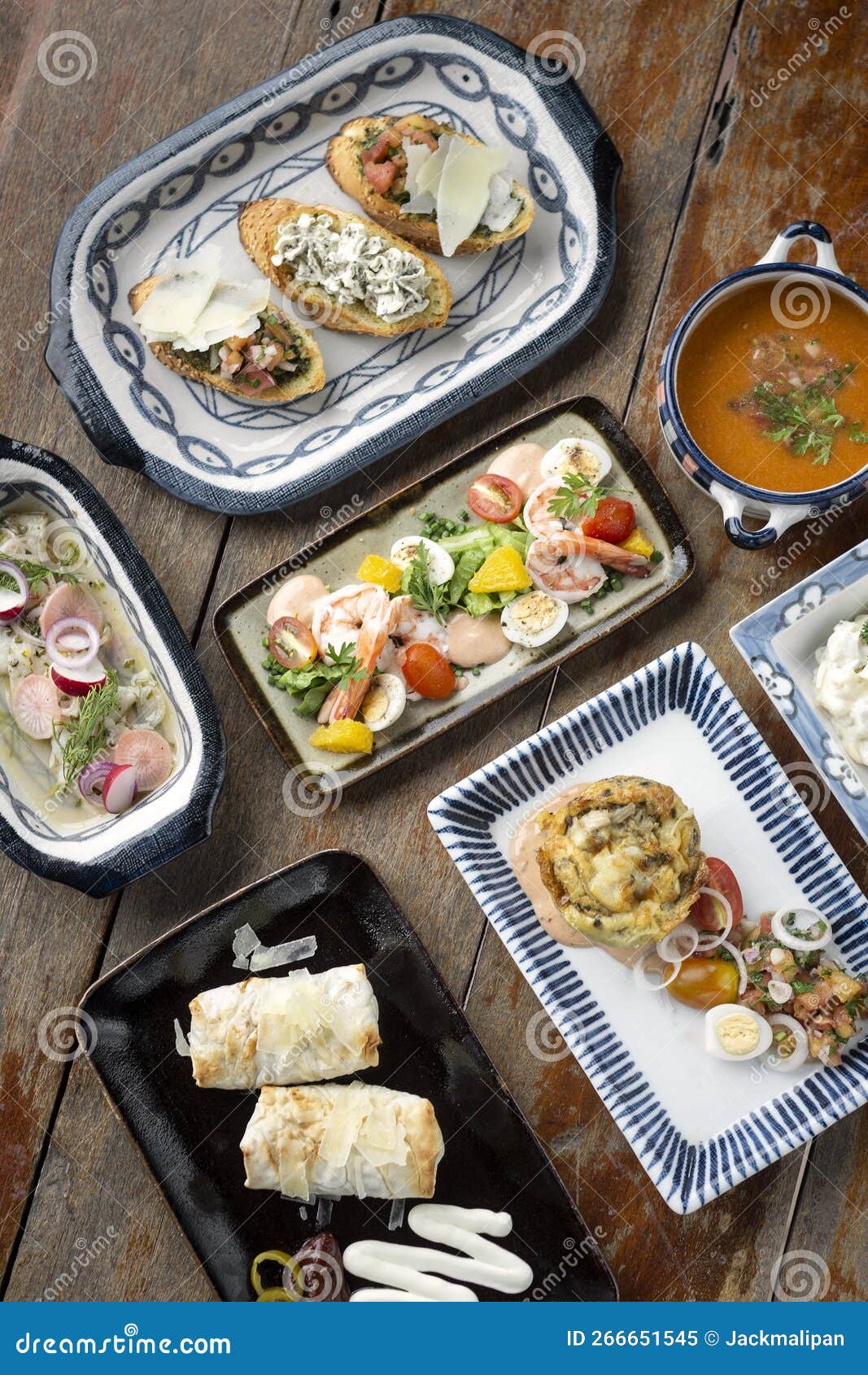Selection of Many Different Tapas on Rustic Wood Table Stock Image ...