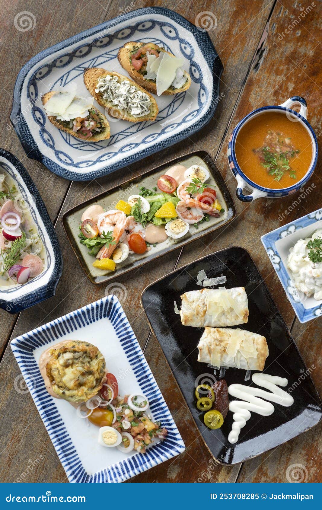 Selection of Many Different Tapas on Rustic Wood Table Stock Image ...