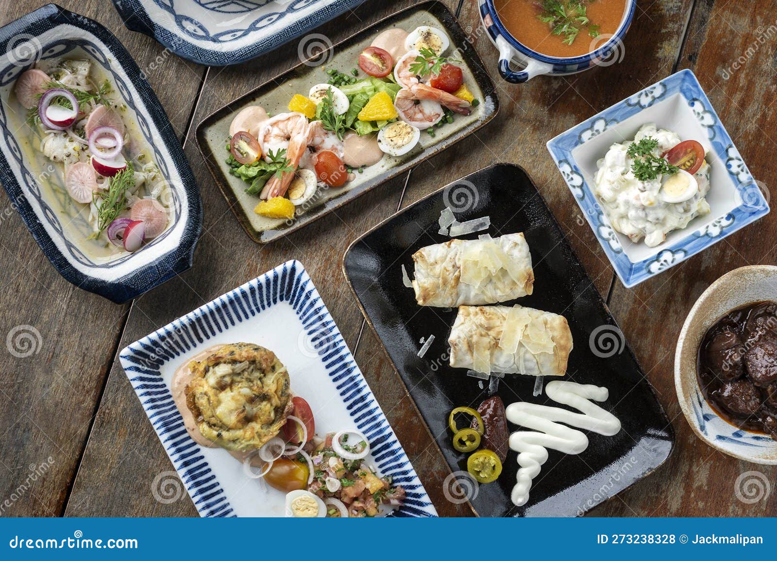 Selection of Many Different Tapas on Rustic Wood Table Stock Photo ...