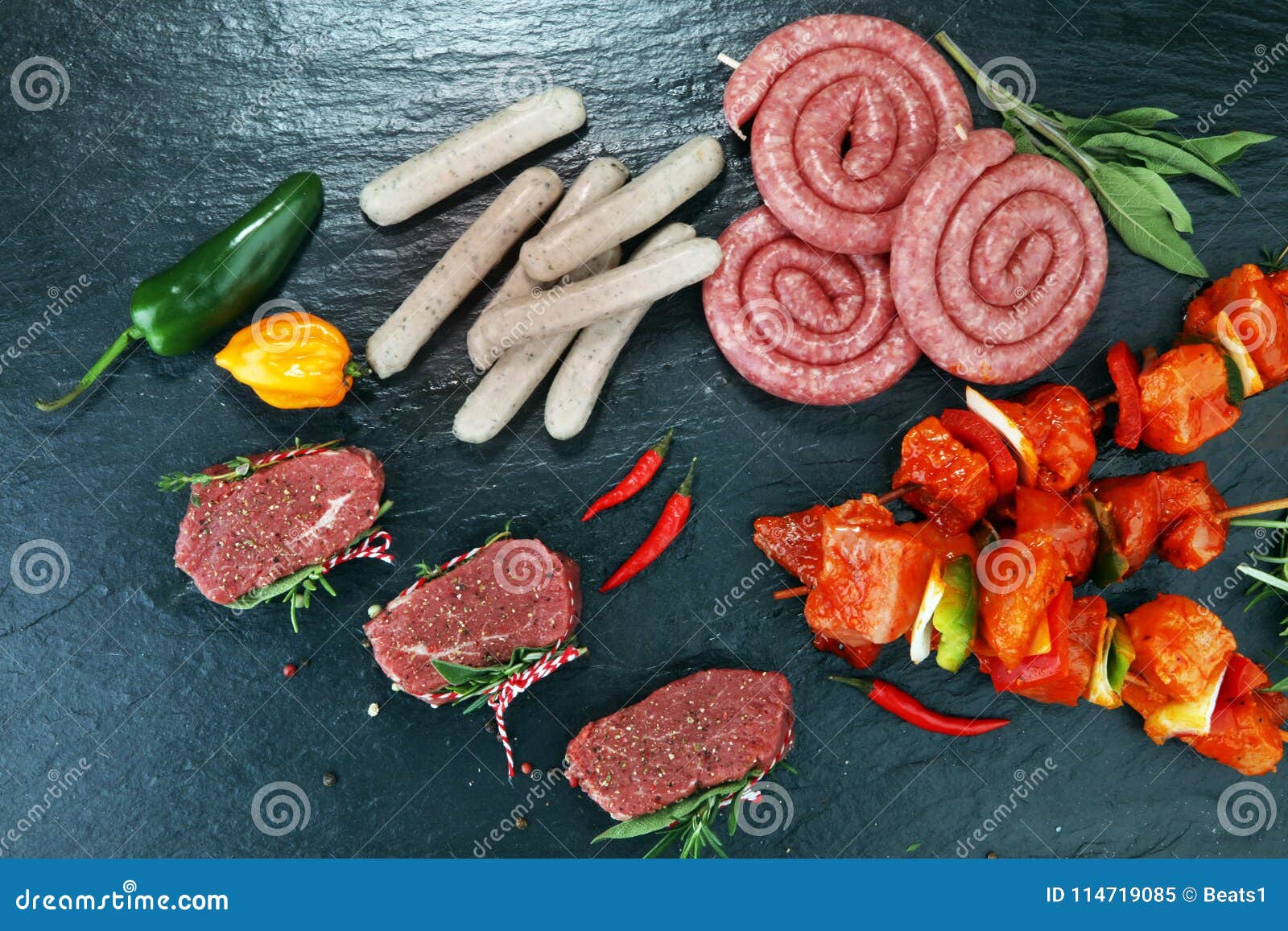 Selection of Marinaded Meat for Bbq Grilling with Herbs on Table Stock ...