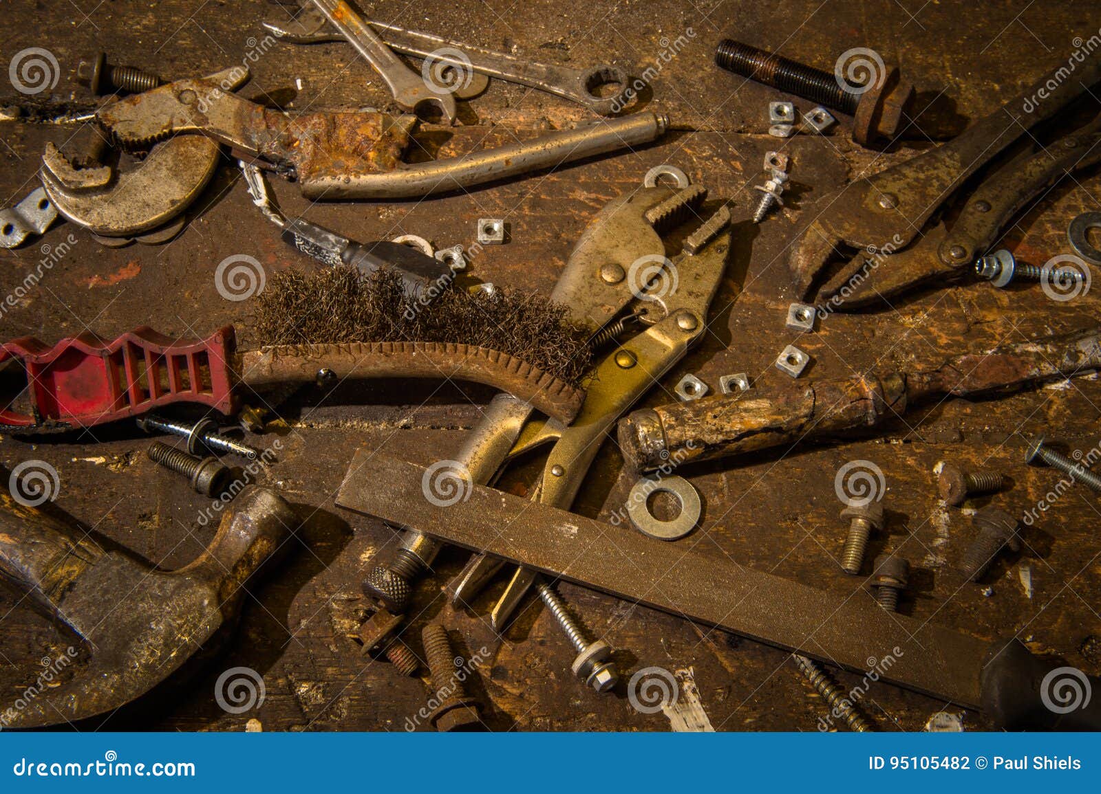 Selection of Old Worn Well Used Tools on Top of an Old Wooden Workbench ...
