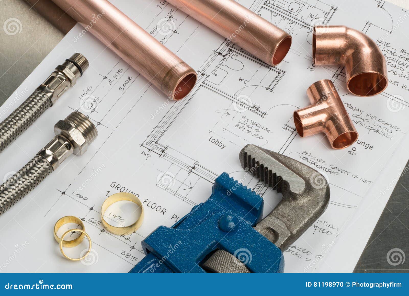 Plumbing Materials, Faucet, Tools, Fittings And Hose On Wooden Boards ...