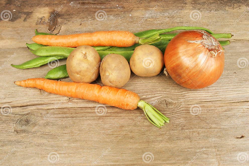 Selection of Vegetables on Rustic Wood Stock Photo - Image of mixed ...