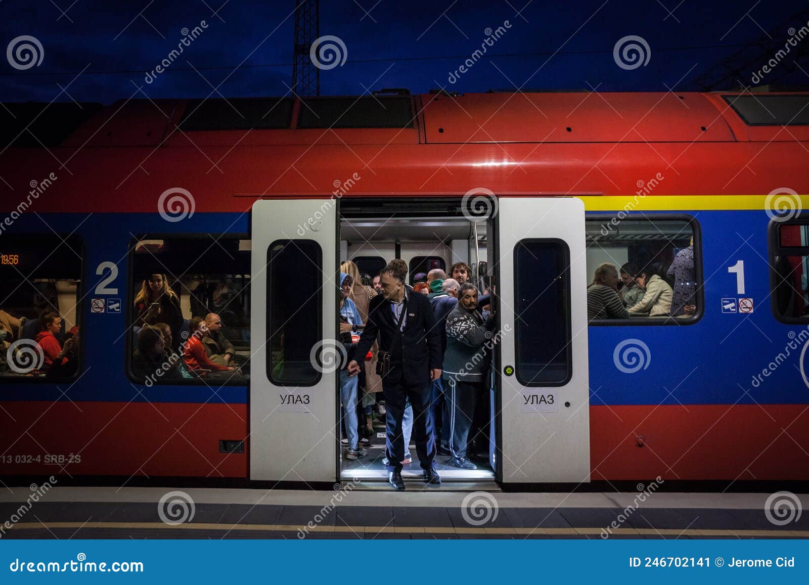 Selective Blur On A Conductor Watching The Doors Of A Crowded Train ...