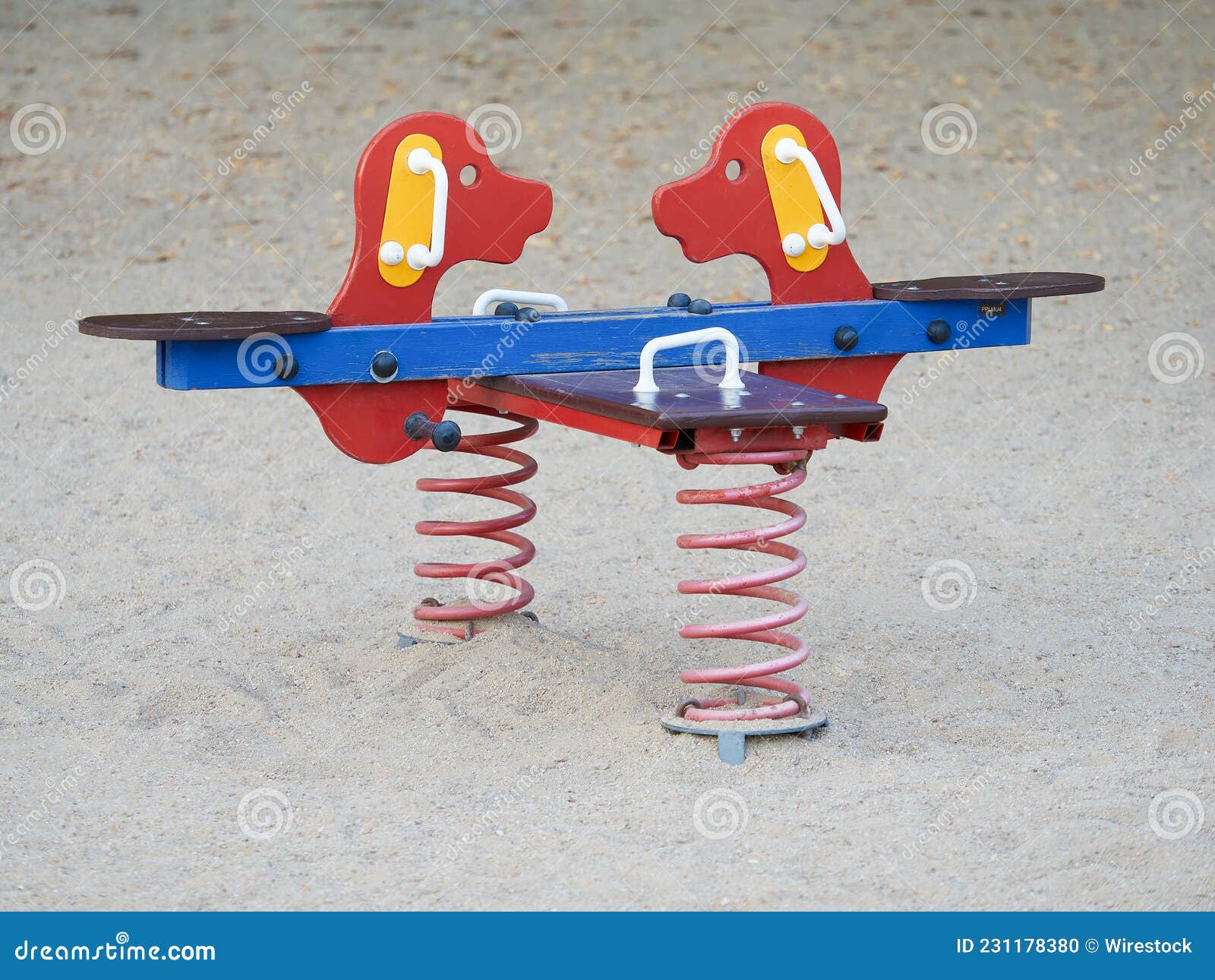Selective Closeup of Rocking Dogs in a Playground Stock Photo - Image ...