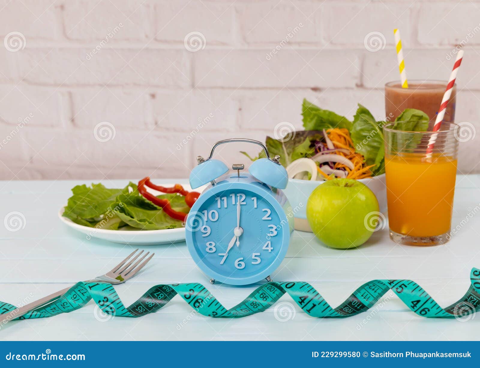 Selective Focus of Blue Clock Intermittent Fasting Concept Above ...