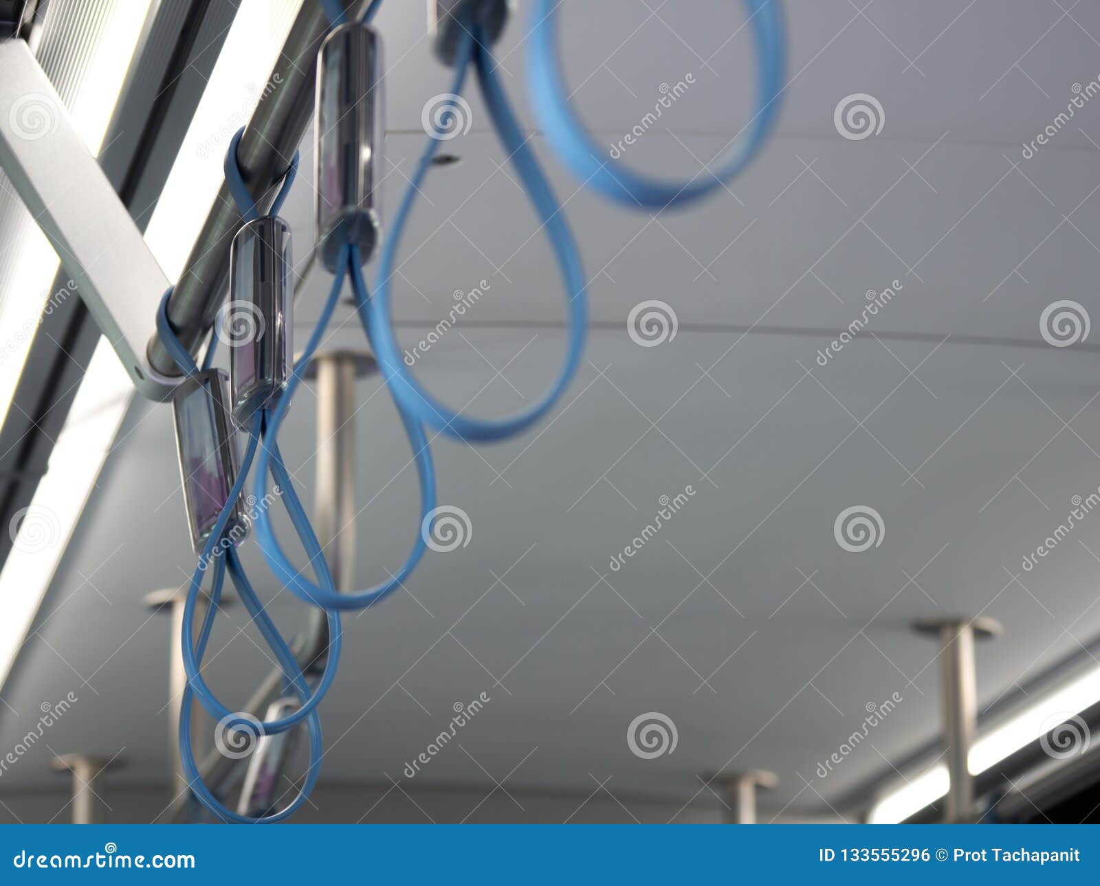 Selective Focus of Blue Loop Handles Inside Metro Subway Train for the ...