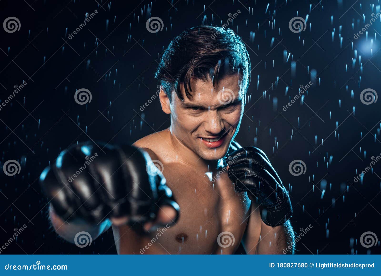 Selective Focus on Boxer in Leather Gloves Standing Under Water Drops ...