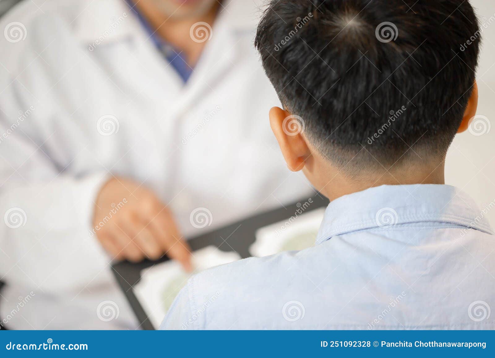 Selective Focus of Boy Doing Eye Test Checking Examination with ...