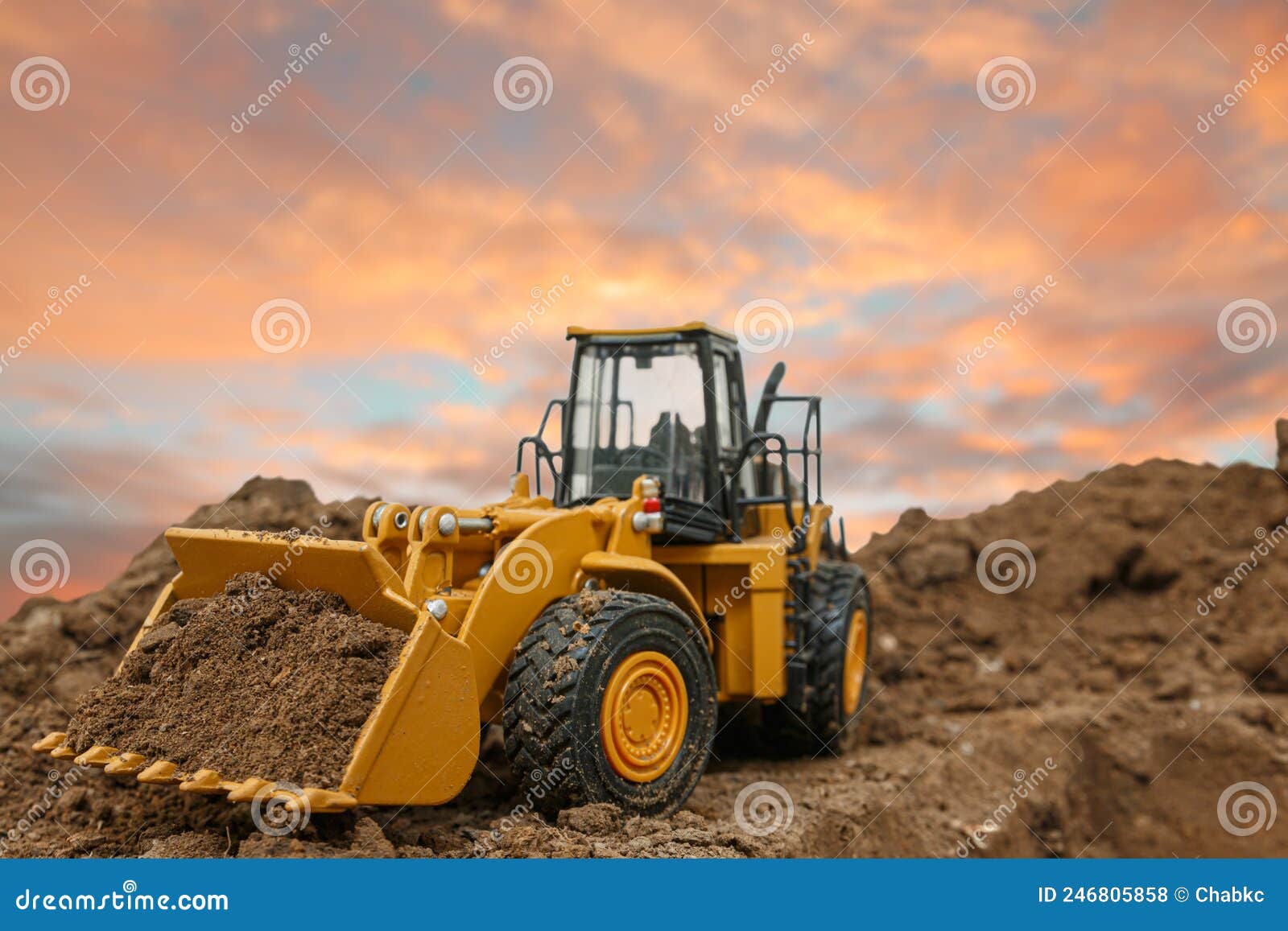Selective Focus with Bucket,Wheel Loader are Digging the Soil ...