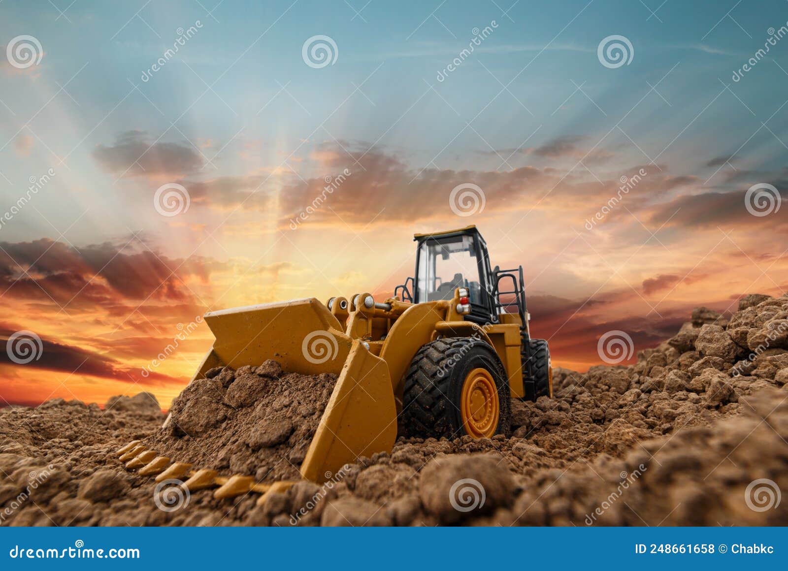 Selective Focus with Bucket,Wheel Loader are Digging the Soil in the ...