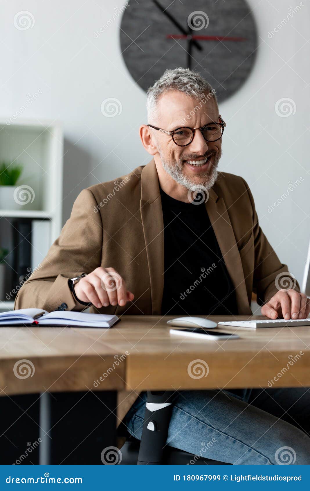 Focus Of Cheerful Businessman In Glasses Smiling In Office Stock Image