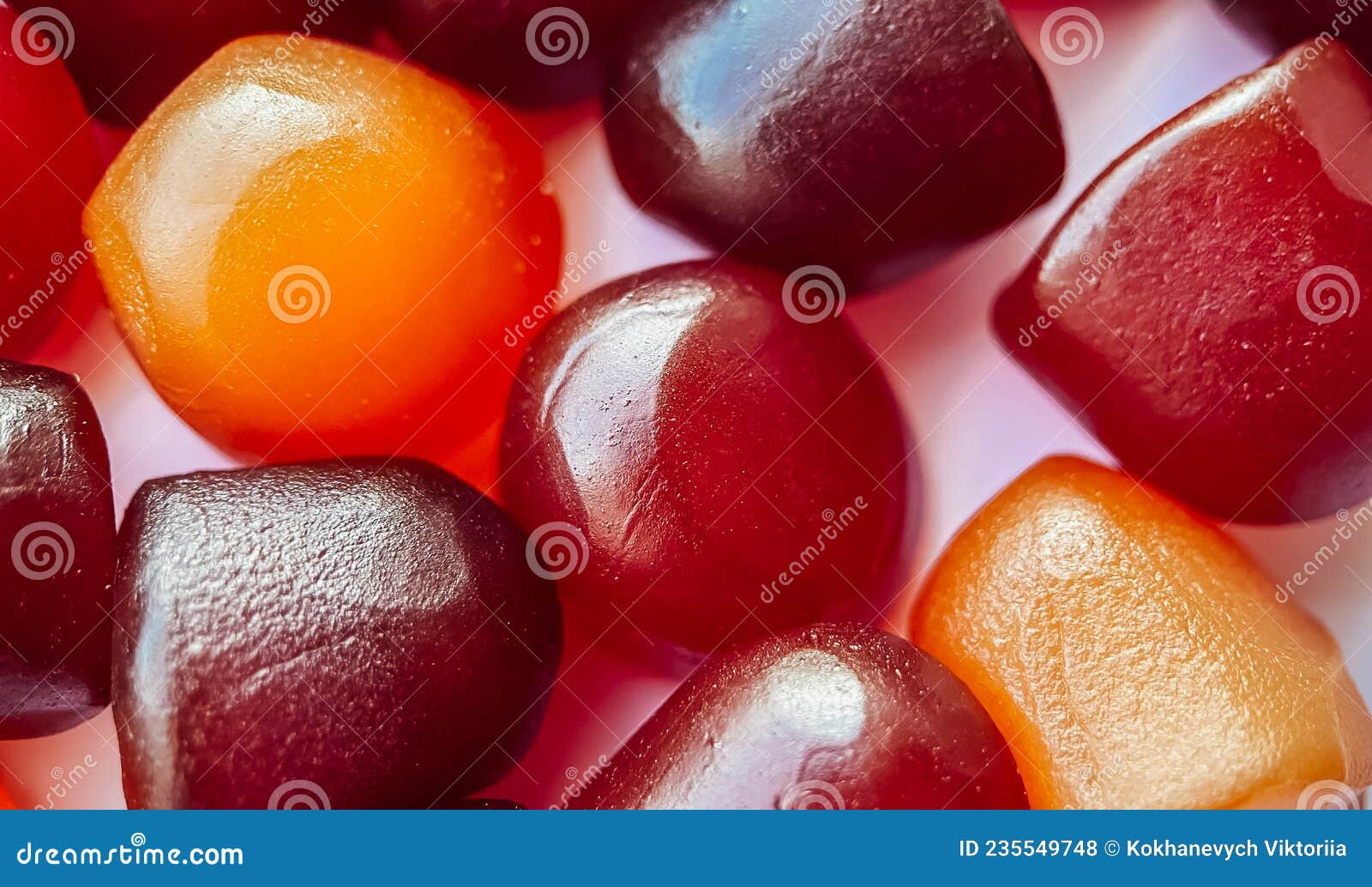 Selective Focus.Close-up Texture of Red, Orange and Purple Multivitamin ...