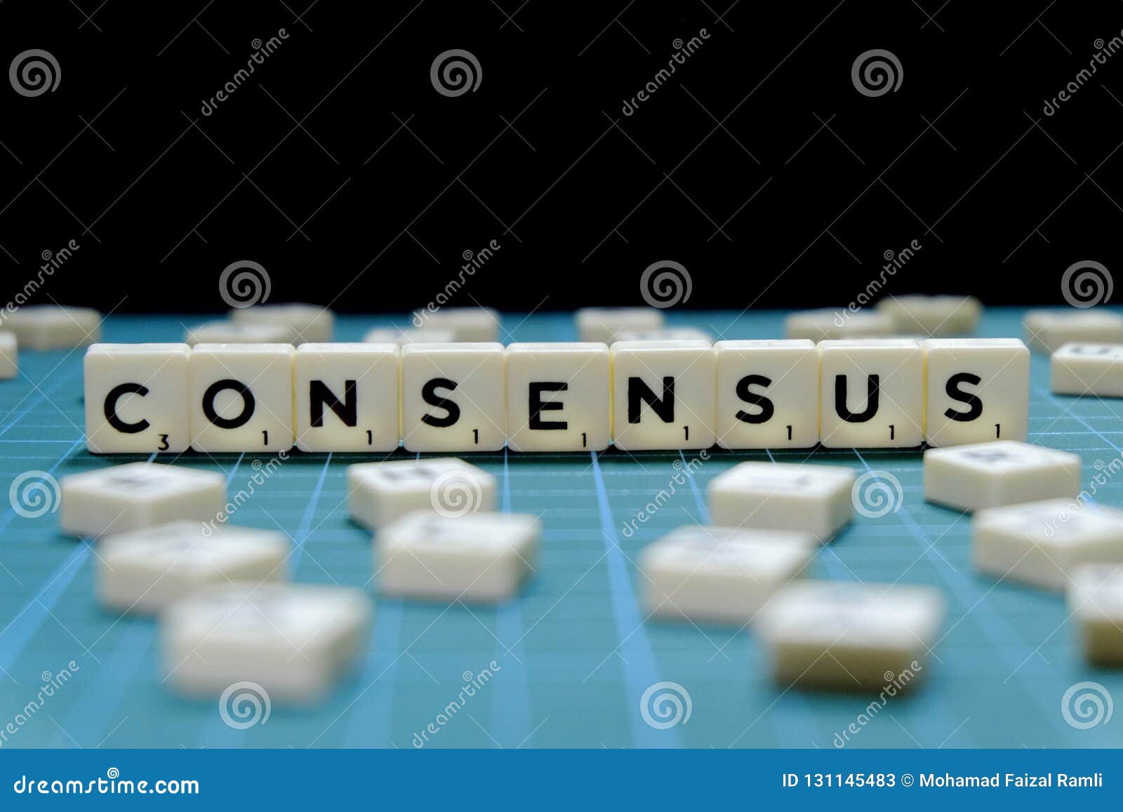 CONSENSUS Word Made With Building Blocks On The Bright Yellow ...