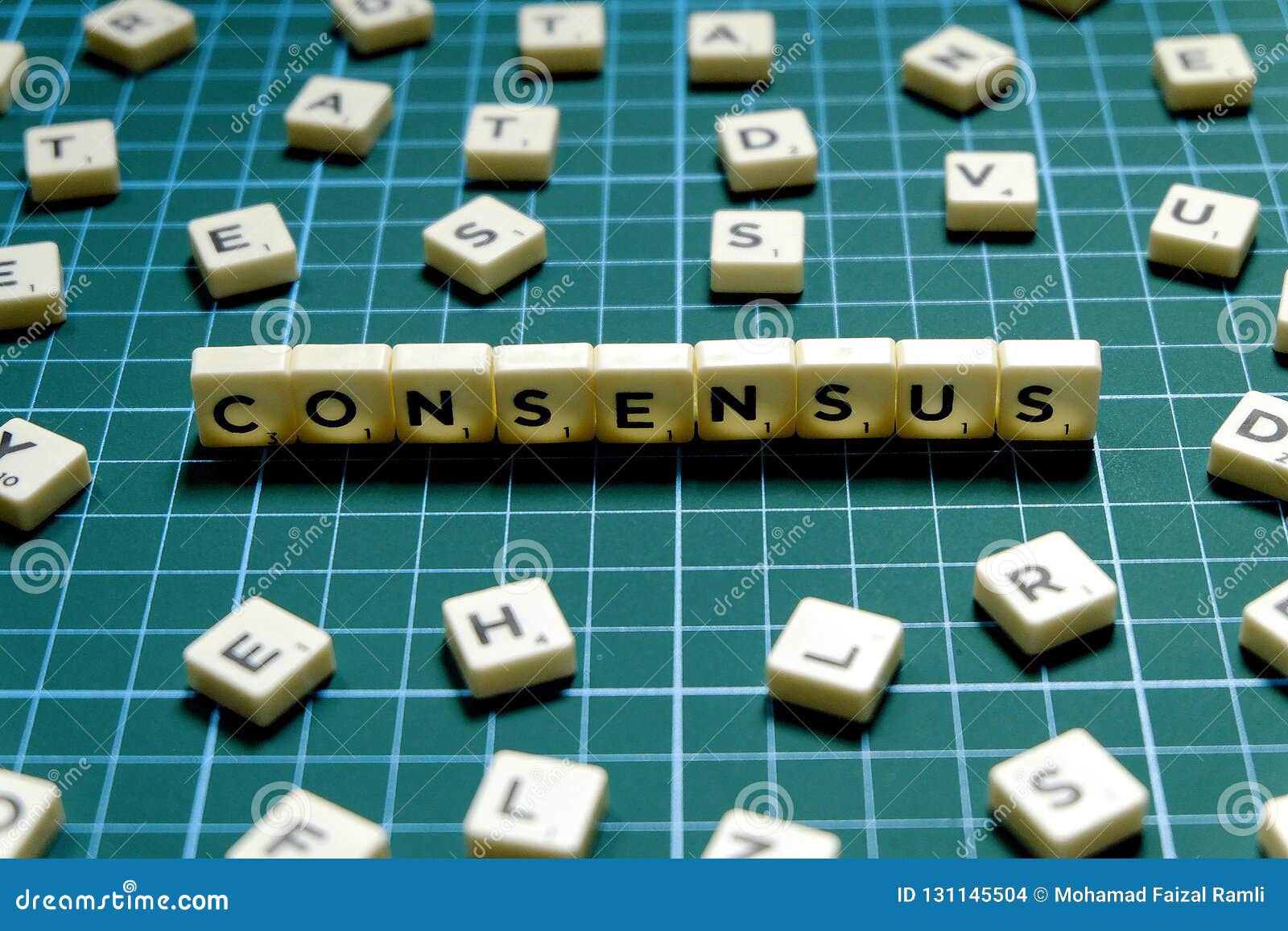 Selective Focus of Consensus Word Made of Square Letter Block on Green ...
