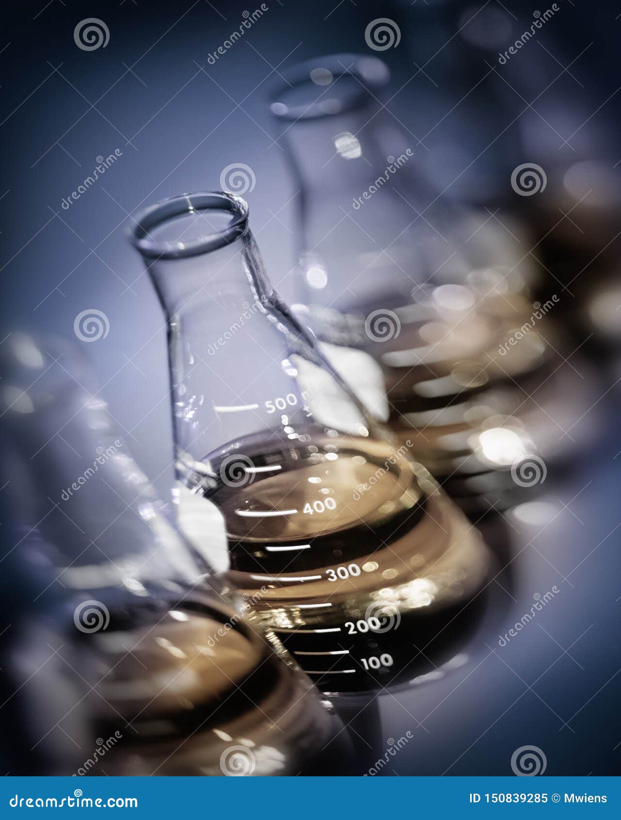 Flasks With Yellow And Blue Liquid In Chemistry Lab. Stock Image ...