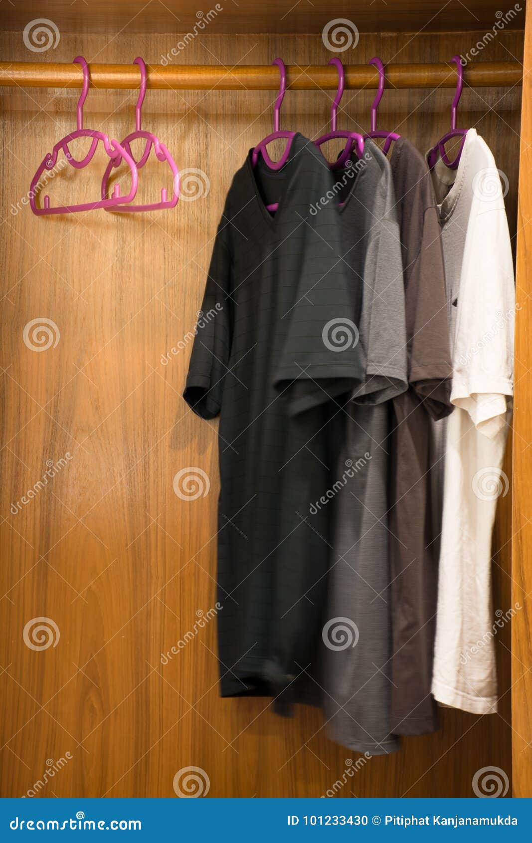 Selective Focus Empty Coat Hanger in Wardrobe Stock Photo - Image of ...