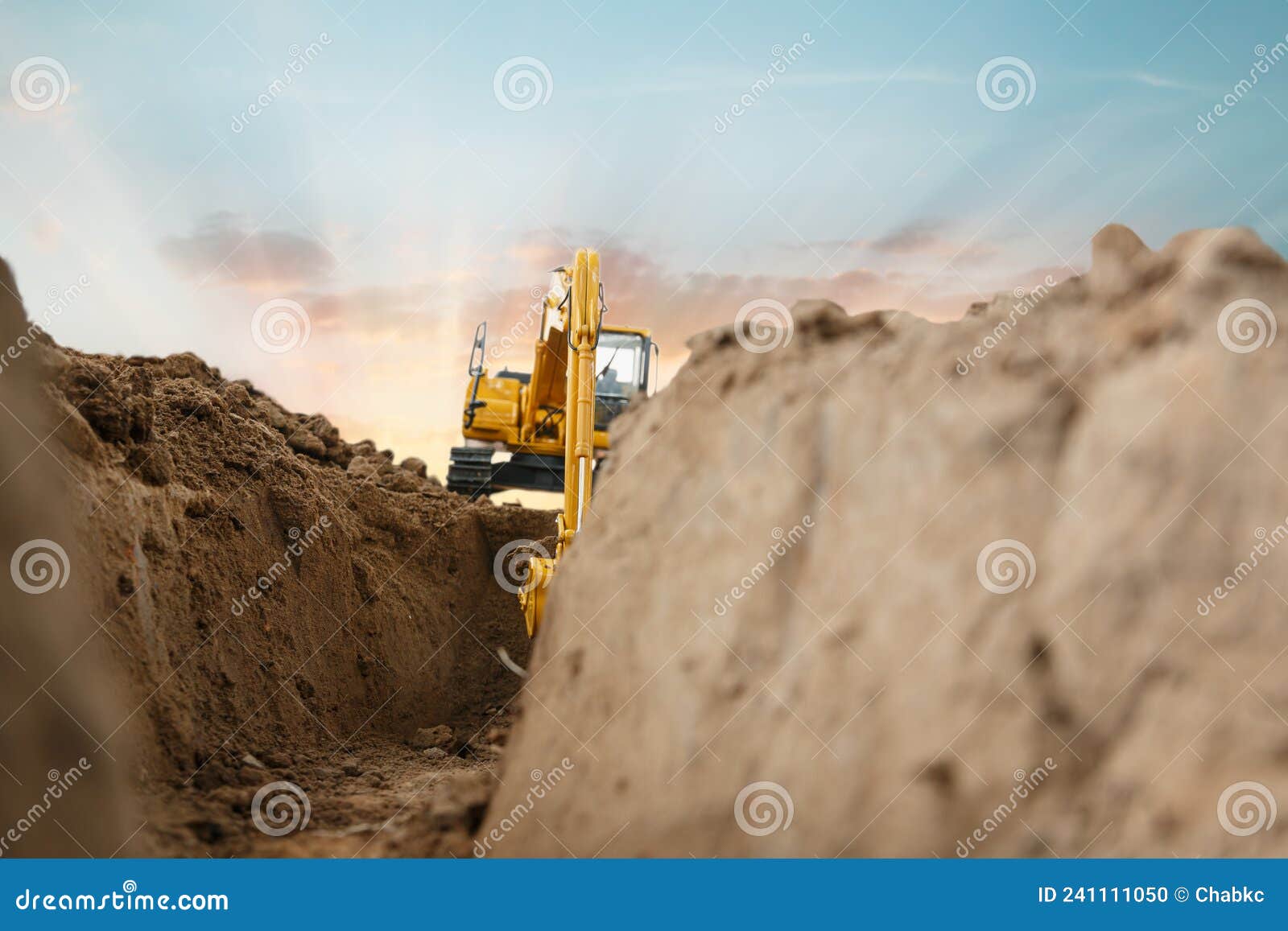 Selective Focus ,Excavator with Bucket are Digging Canalize the Soil in ... Selective Focus ,Excavator with Bucket are Digging Canalize the Soil in ...