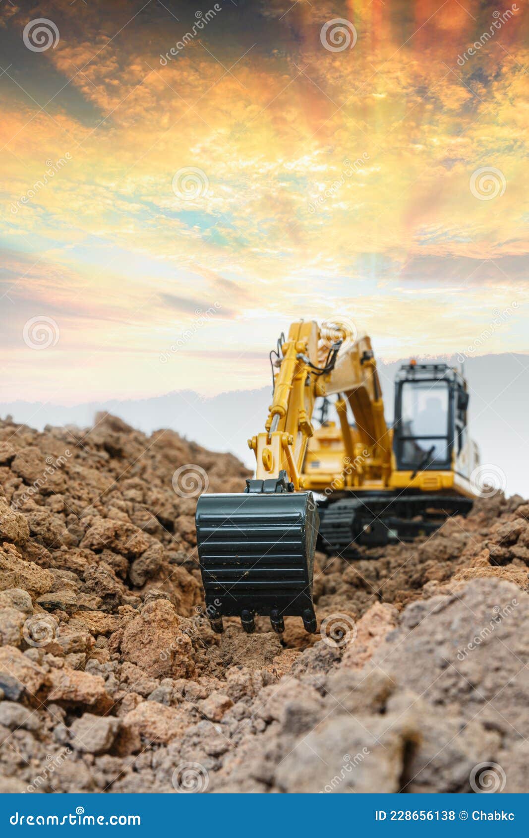 Selective Focus ,Excavator with Bucket are Digging the Soil in the ... Selective Focus ,Excavator with Bucket are Digging the Soil in the ...