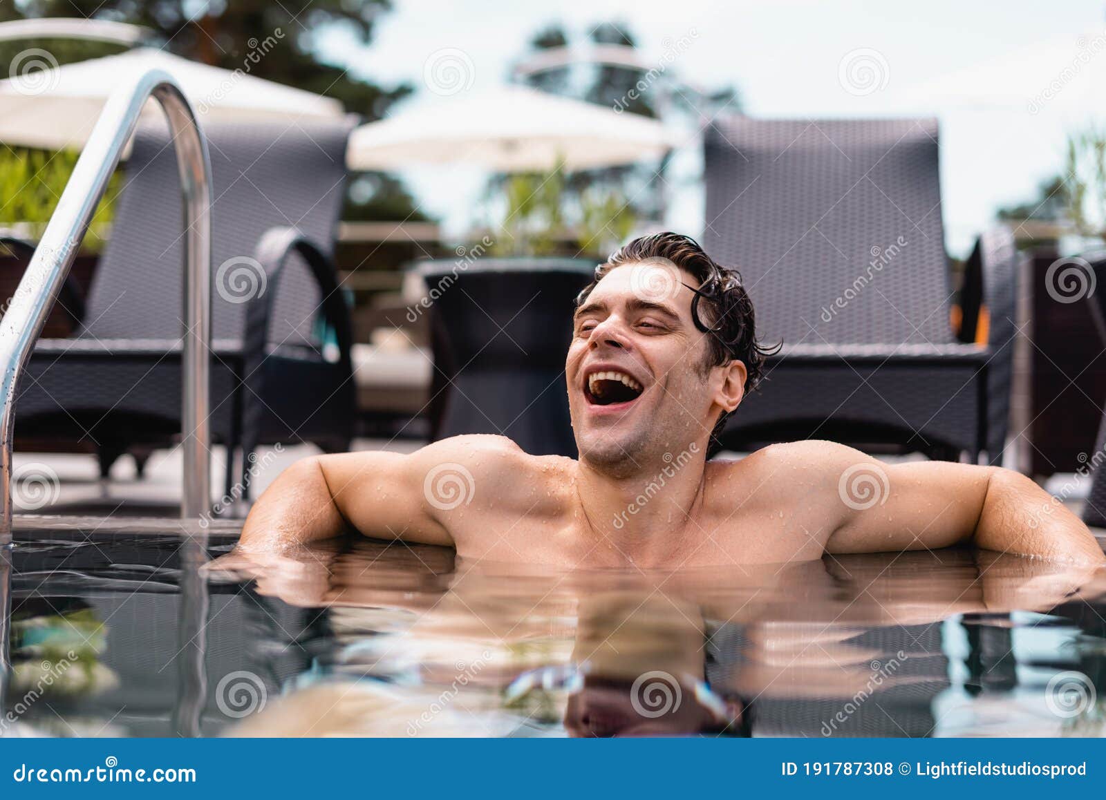 Focus of Excited and Wet Man Laughing in Swimming Pool Stock Photo ...