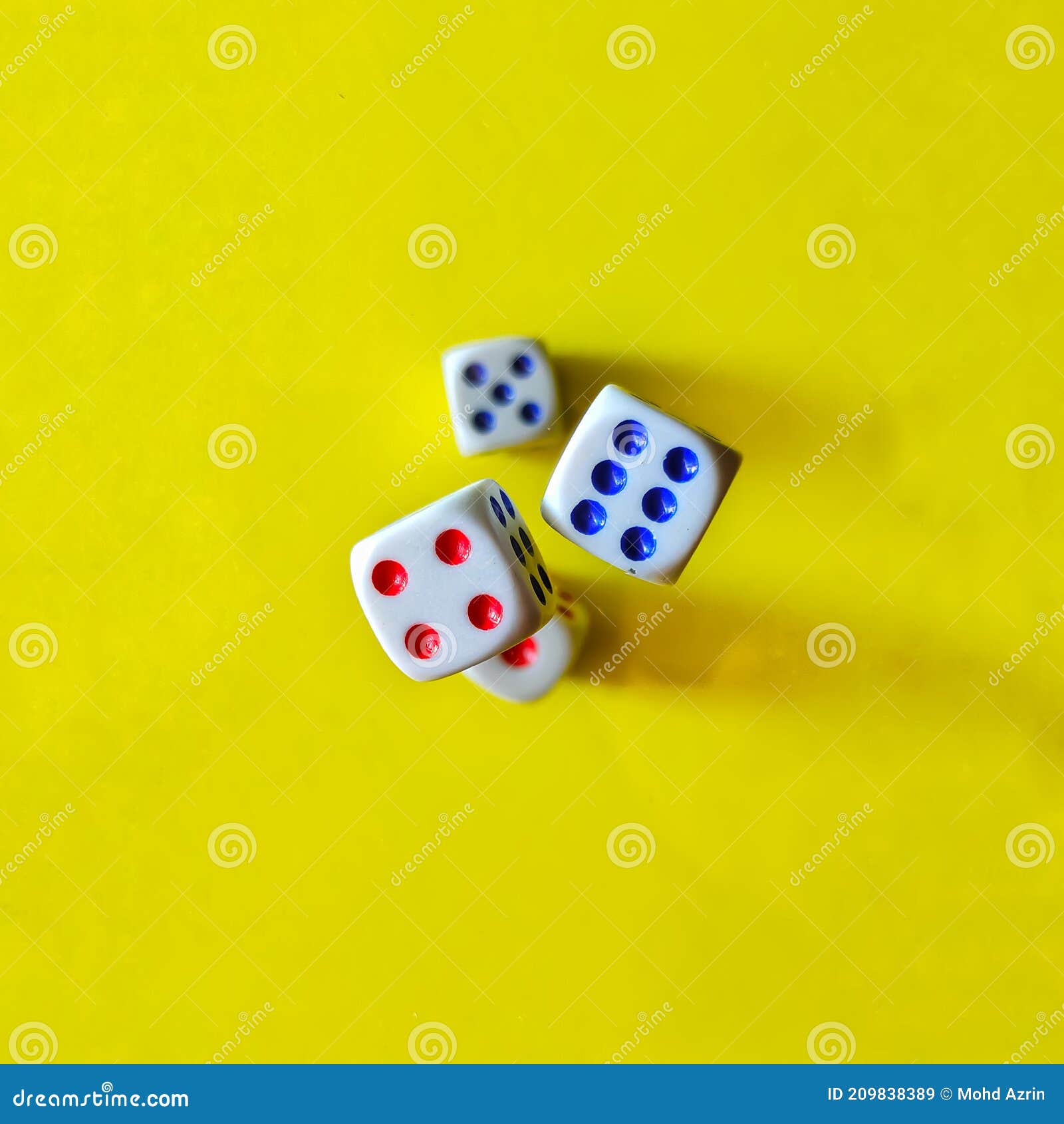 Selective Focus.Floating Dice on a Yellow Background Stock Image ...