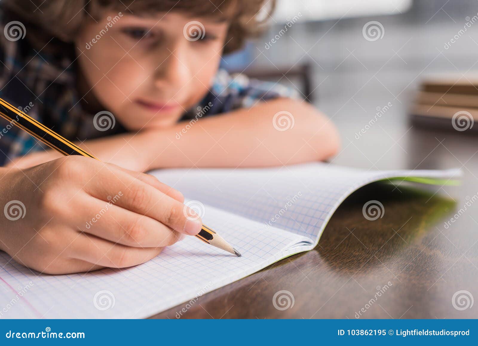 Kid writing in copybook stock image. Image of child - 103862195