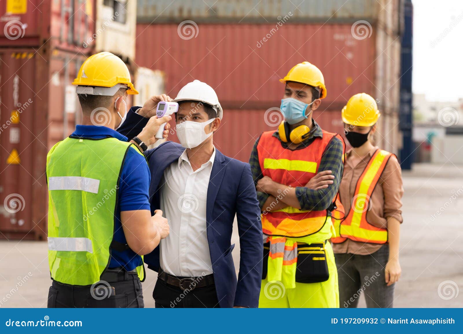 Foreman Using an Infrared Thermometer Measuring Temperature To Check ...