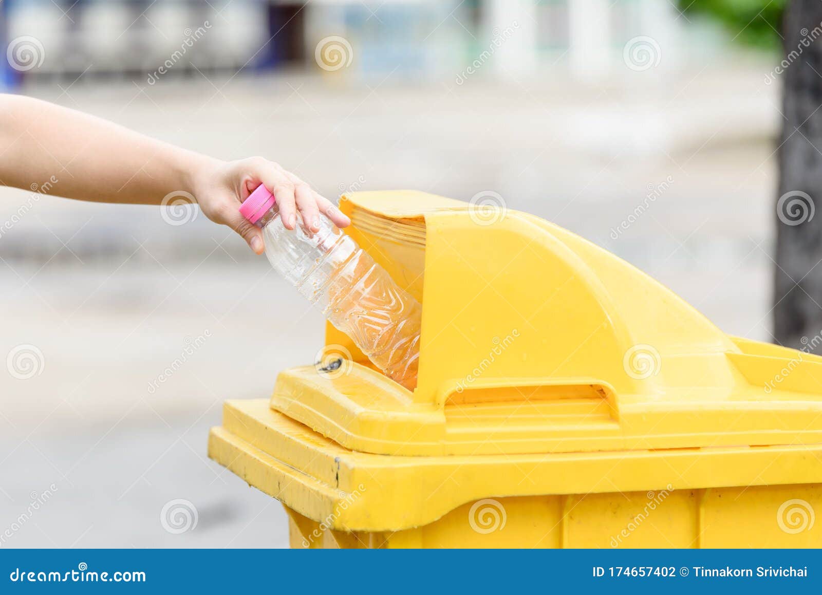 Hand drop bottle stock photo. Image of trow, person - 174657402