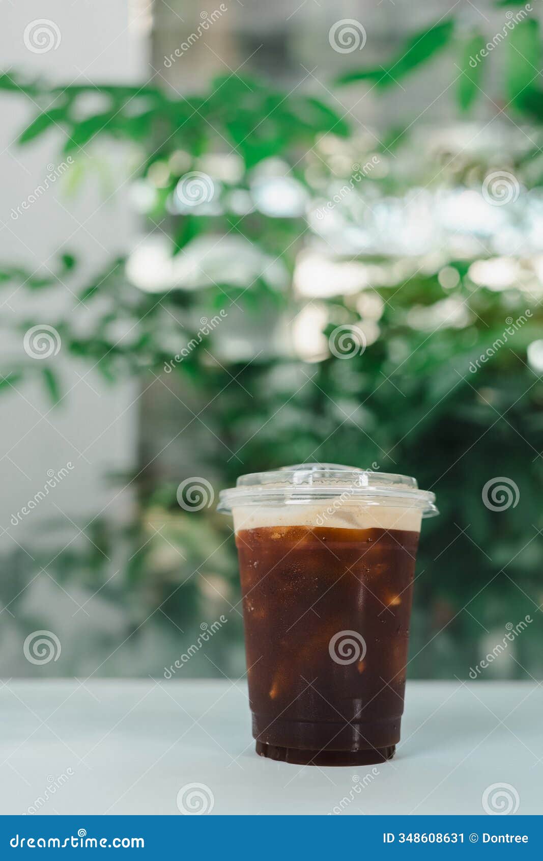 Selective Focus of Iced Dark Cold Brew Americano Coffee in Plastic Cup ...