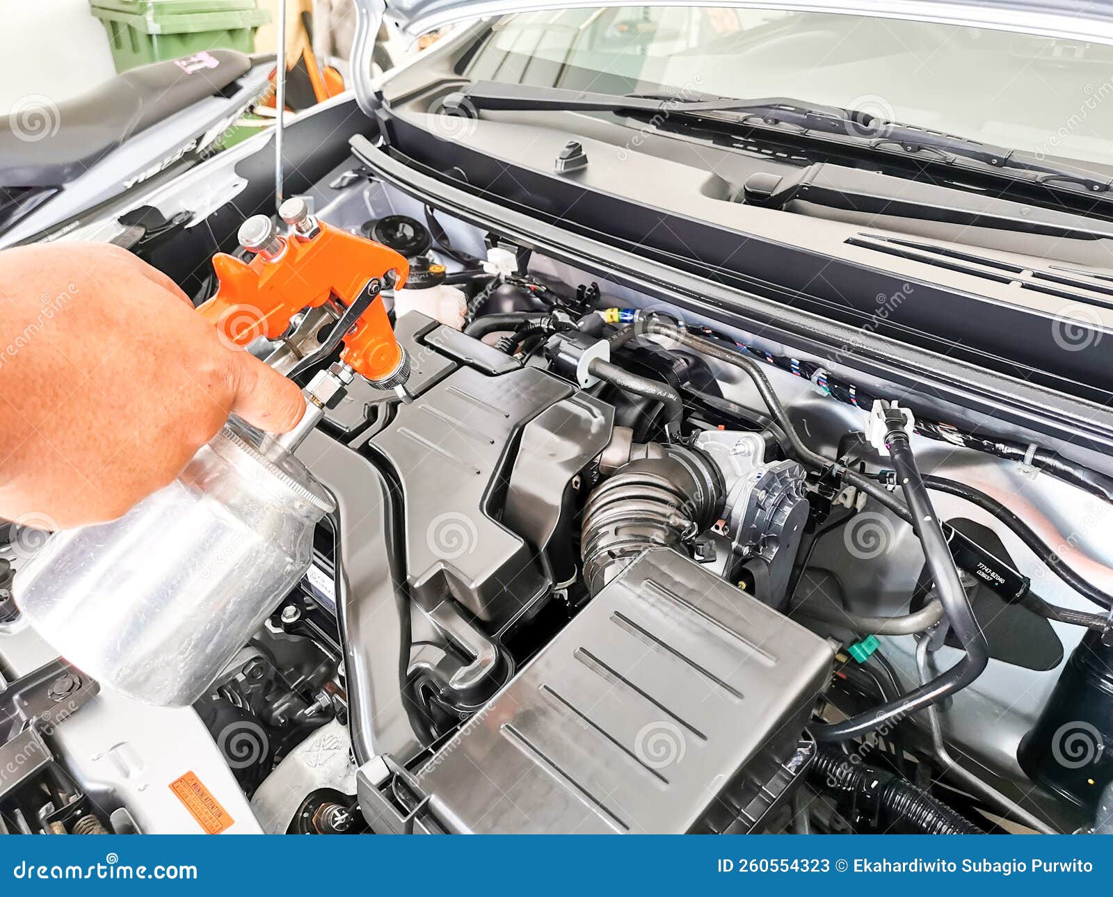 Selective Focus Image of a Man Cleaning Car Engine Compartment. Car ...