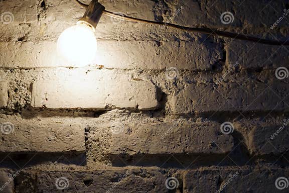 Selective Focus of Light Bulb with Brick Wall As a Background Stock ...