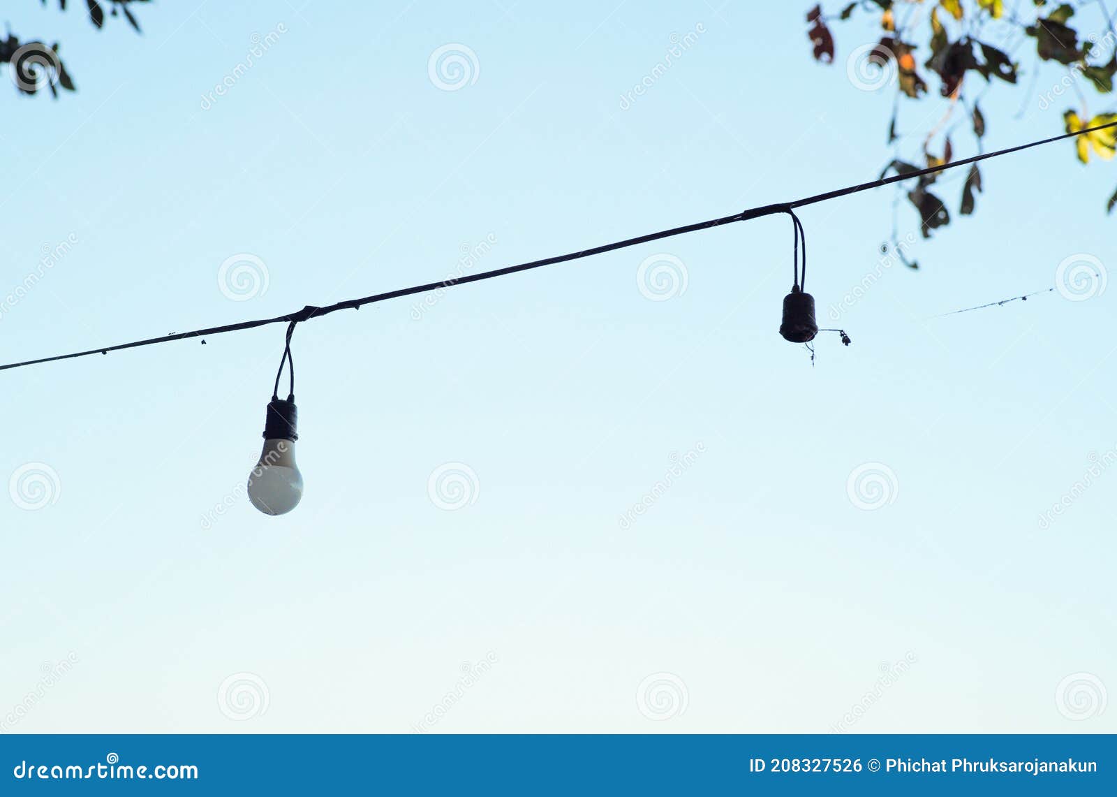 Selective Focus Light Bulbs Hanging on the Electricity Wire with ...